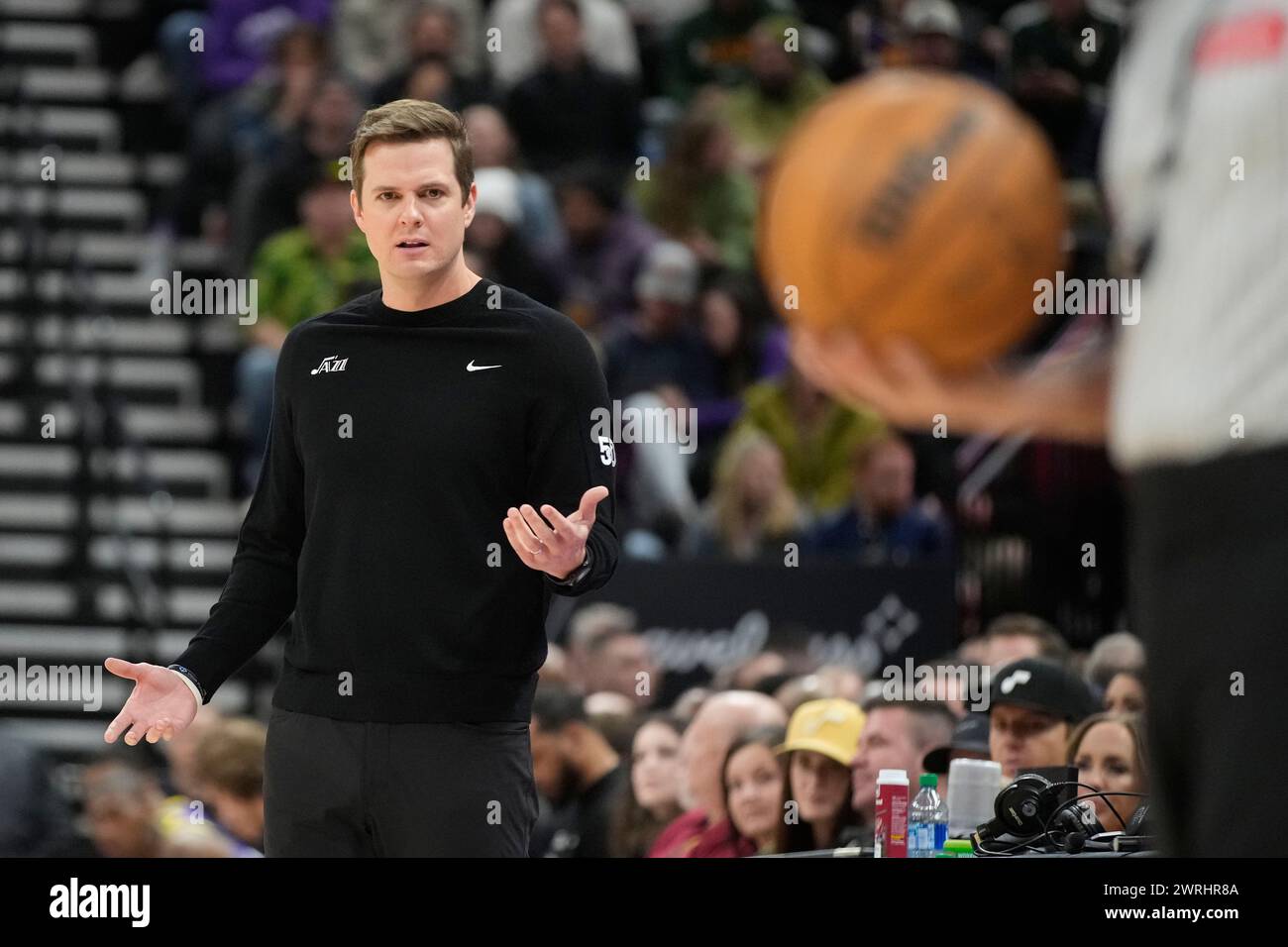 Utah Jazz head coach Will Hardy, left, questions an official during the ...
