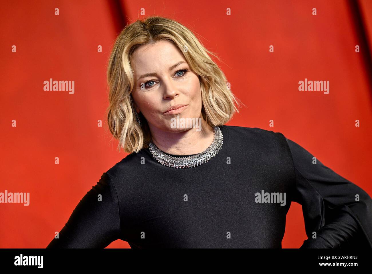 Elizabeth Banks arrives at the Vanity Fair Oscar Party on Sunday, March ...