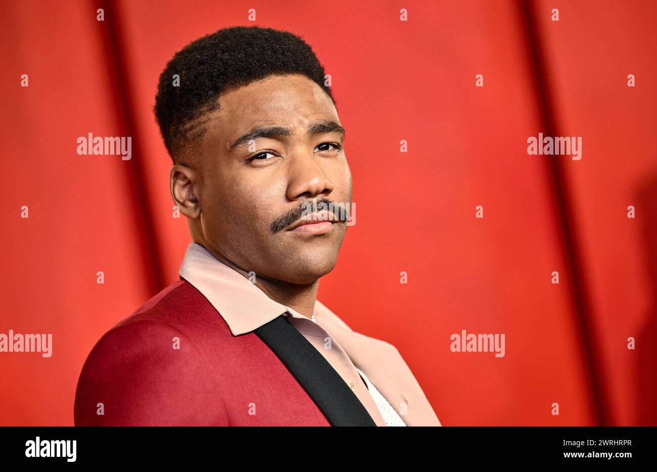 Donald Glover arrives at the Vanity Fair Oscar Party on Sunday, March ...