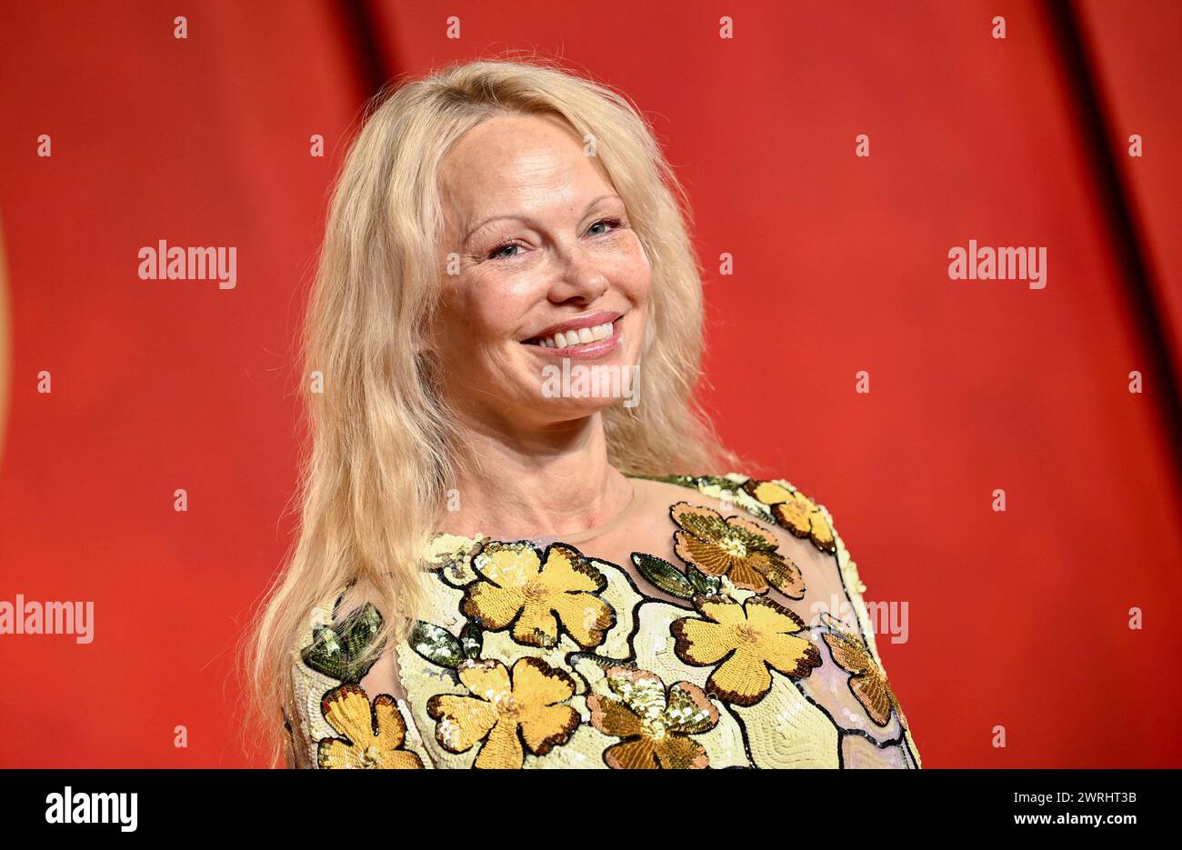 Pamela Anderson arrives at the Vanity Fair Oscar Party on Sunday, March ...