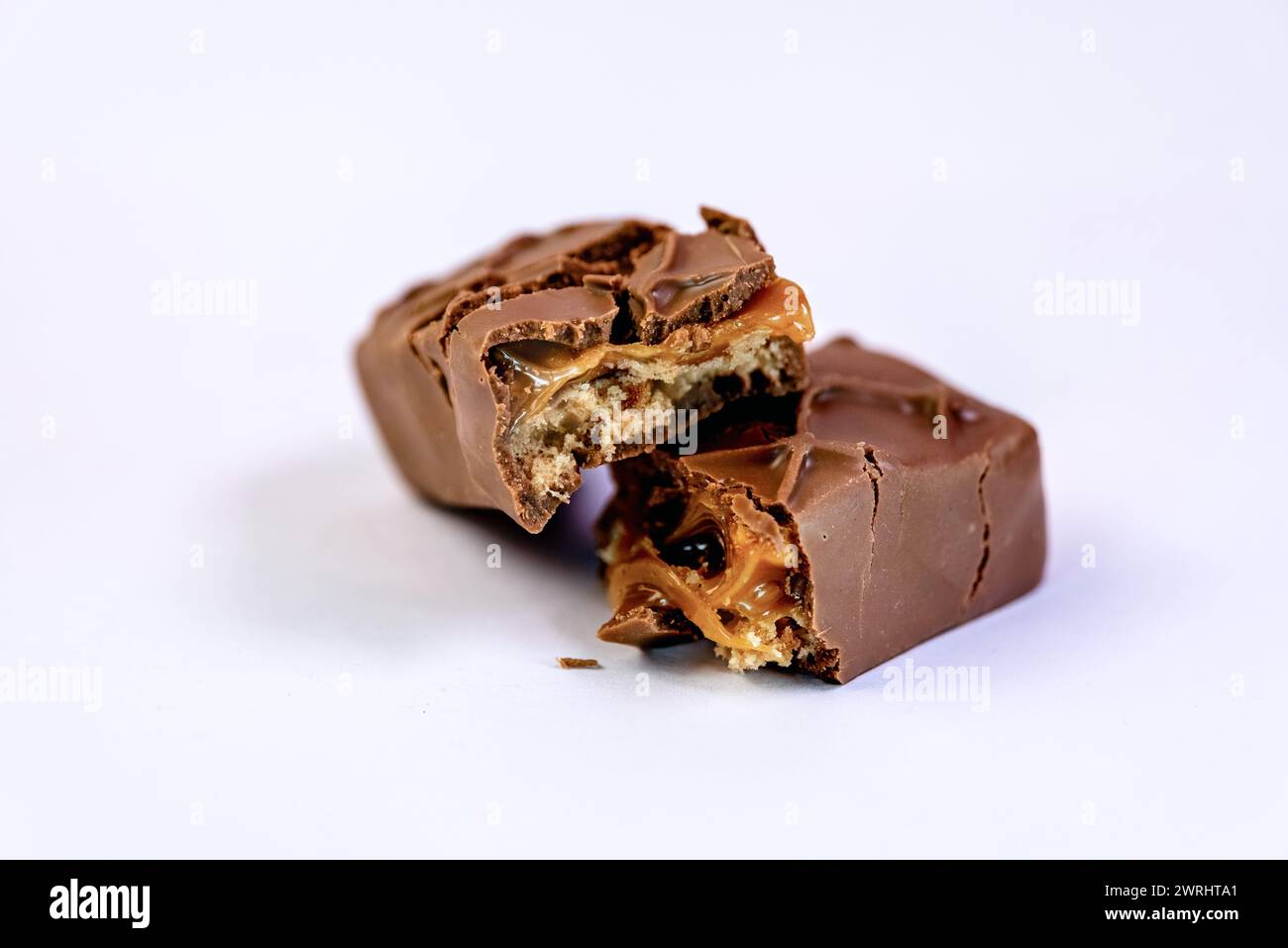 A close-up photo of a mouthwatering chocolate bar packed with chunks of ...