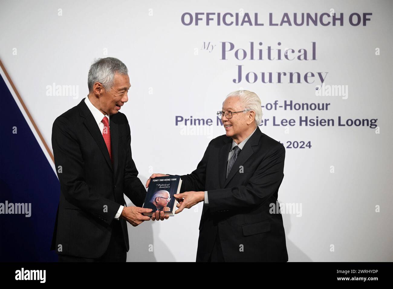 Former president and deputy prime minister Dr Tony Tan presenting a ...