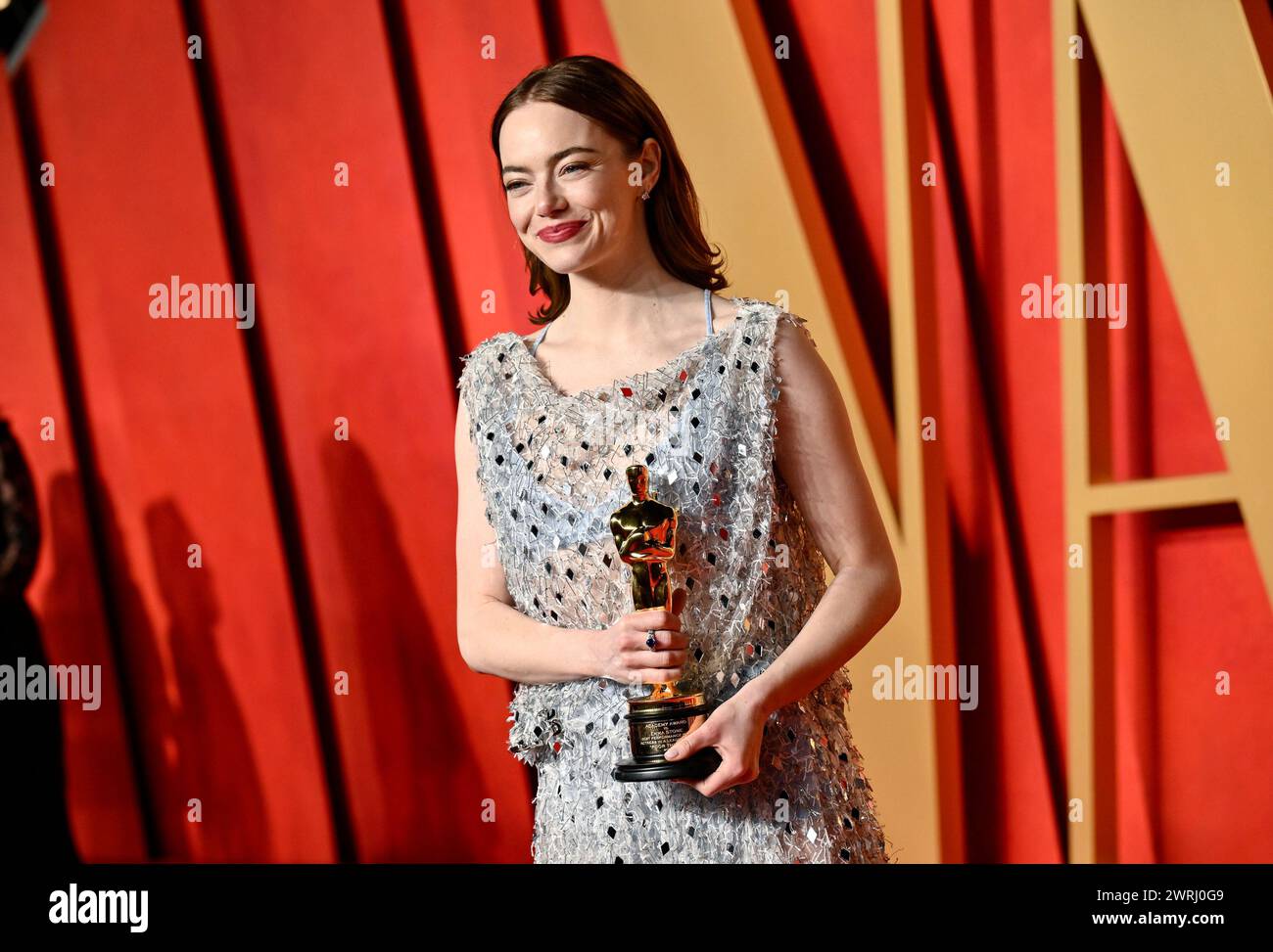 Emma Stone arrives at the Vanity Fair Oscar Party on Sunday, March 10 ...