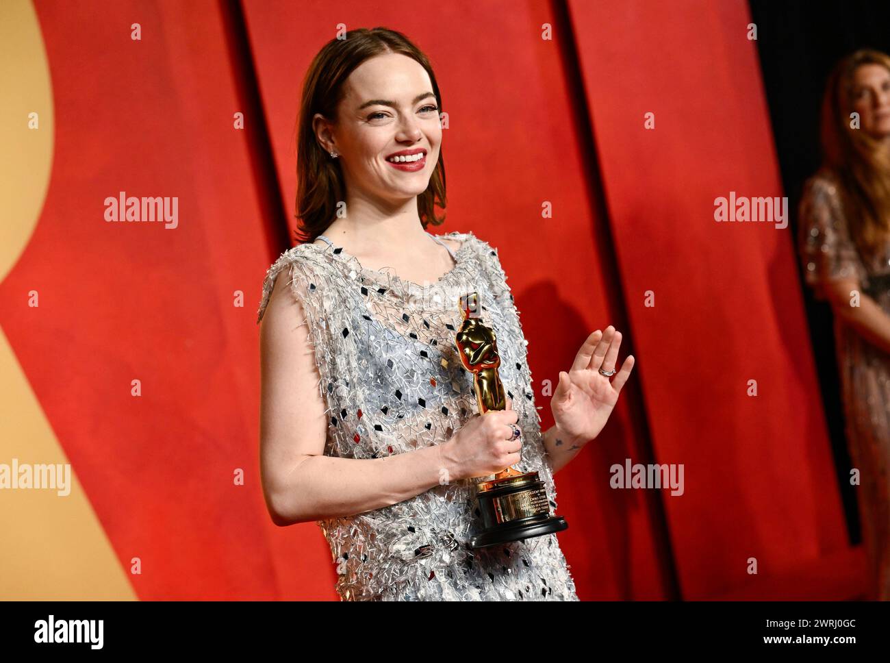 Emma Stone arrives at the Vanity Fair Oscar Party on Sunday, March 10 ...