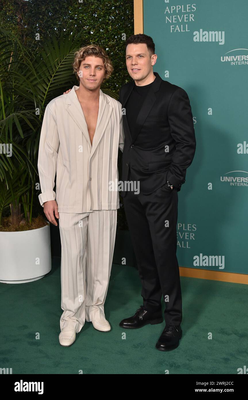 Lukas Gage, left, and Jake Lacy arrive at the premiere of "Apples Never ...