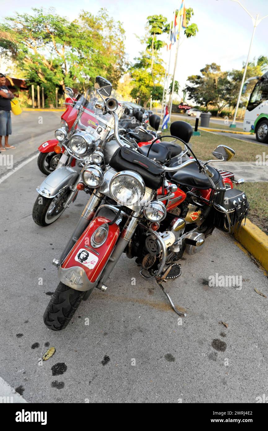 Several motorbikes of different models in a car park, Parque Natural ...