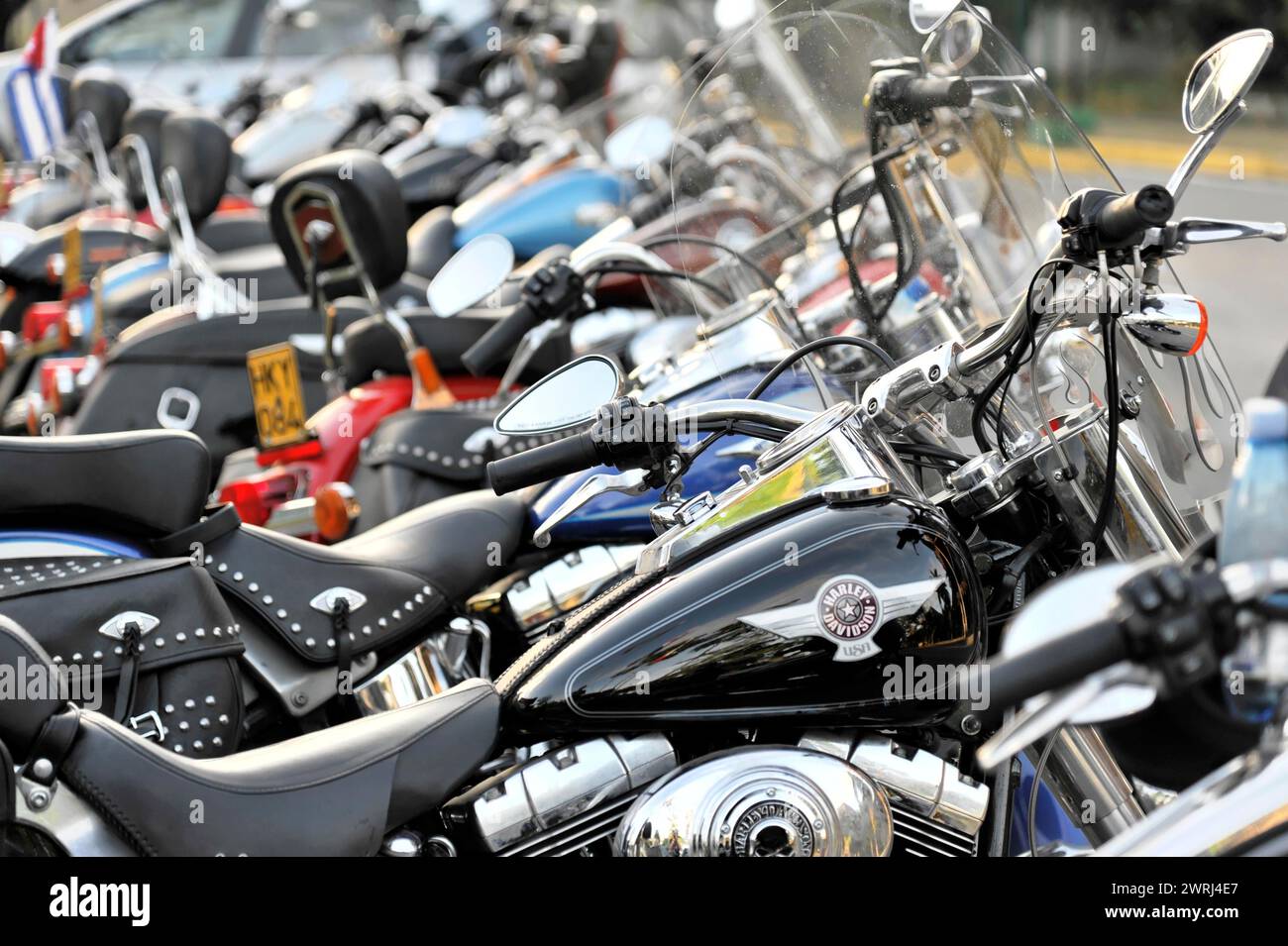 Collection of chrome-plated motorbikes in a public car park, Parque ...