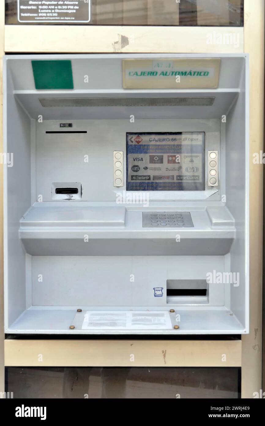 A public ATM for carrying out bank transactions, Guama, Cuba, Central ...