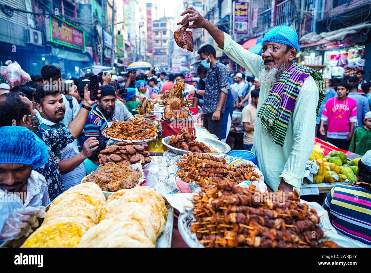 400 year old Iftari market of old Dhaka in Bangladesh. At the beginning ...
