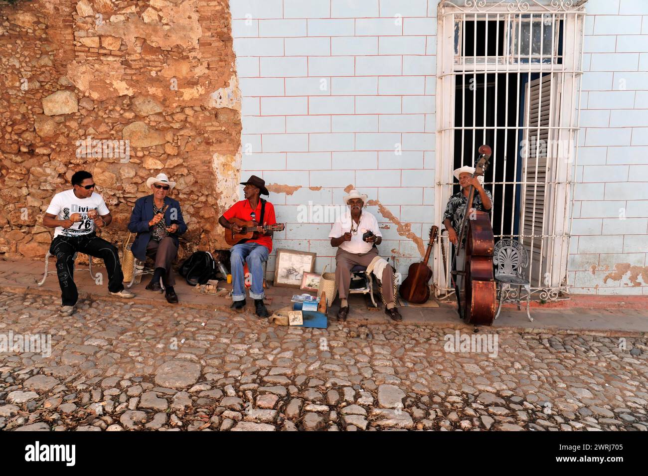 Group of street musicians playing traditional instruments in Cuba ...