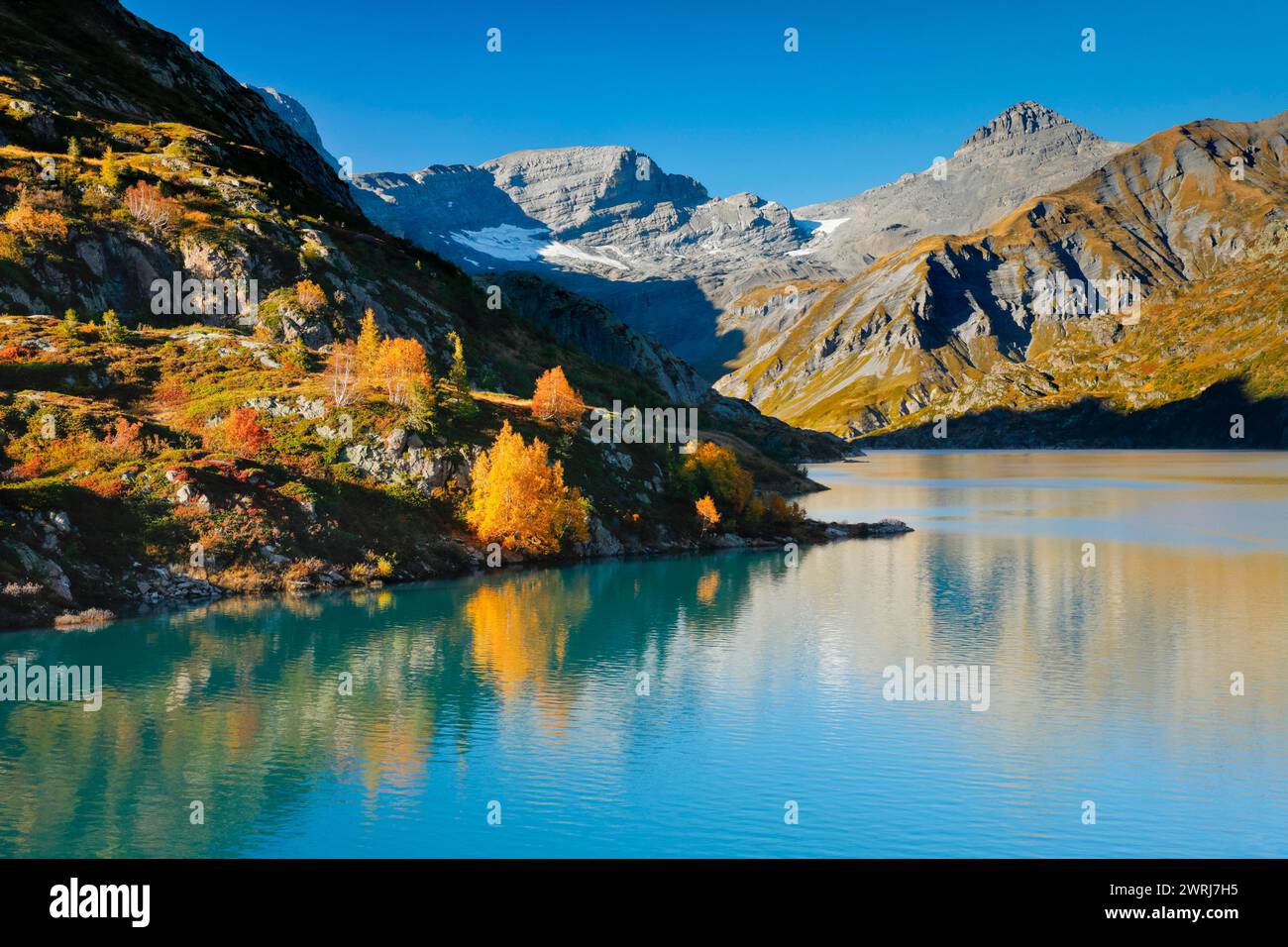Autumn colours at Lac d'Emosson in the Valais mountains, Switzerland ...