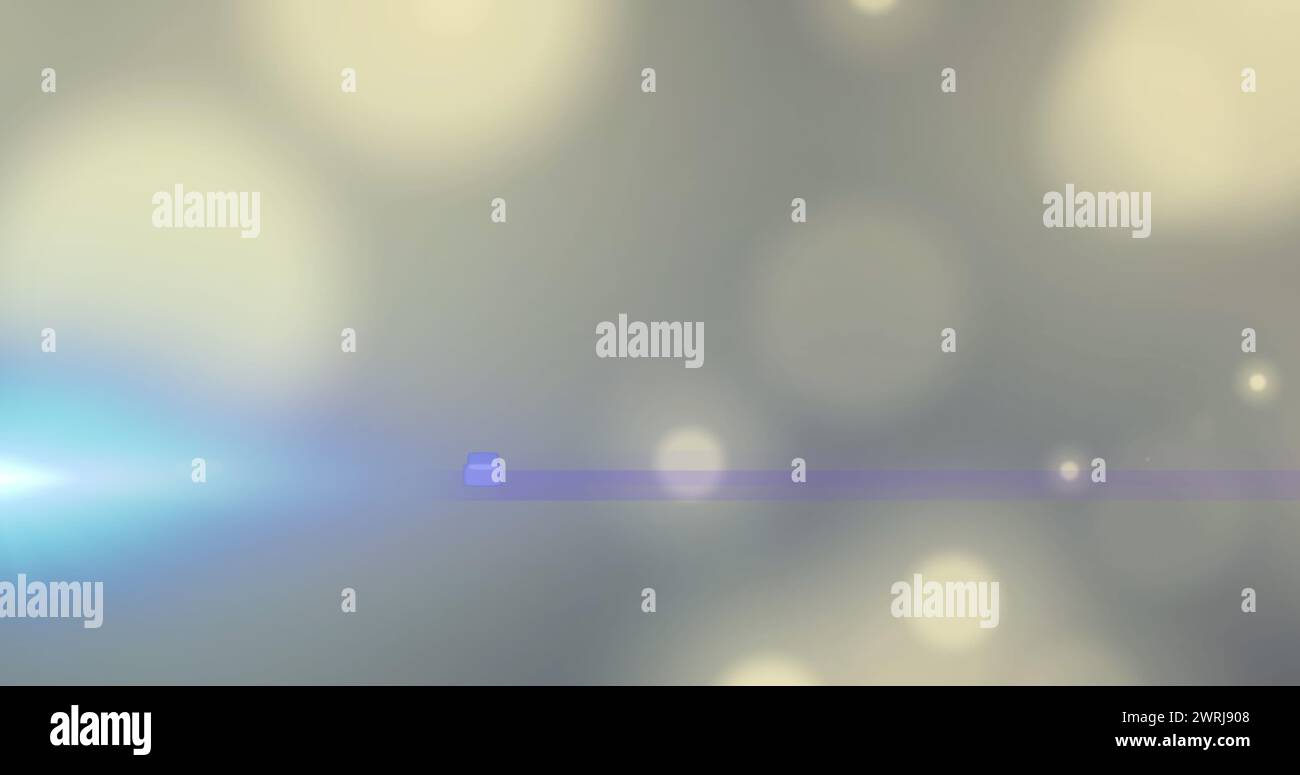 Image of blue spotlight with lens flare over bokeh light spots on grey ...