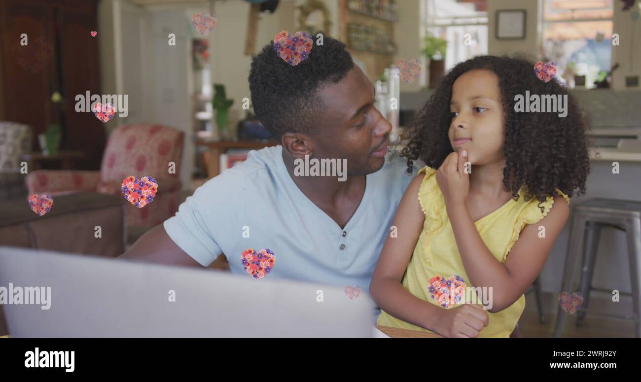 Image of flower hearts over happy african american father and daughter ...