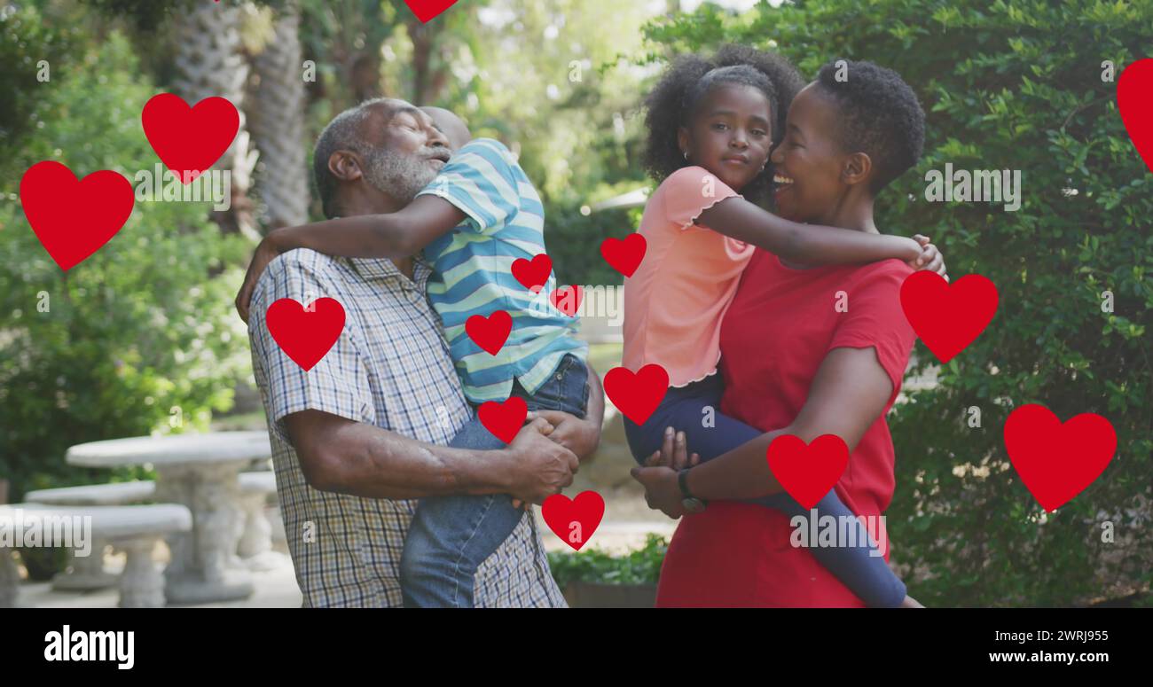 Image of hearts over happy african american multi generation family ...
