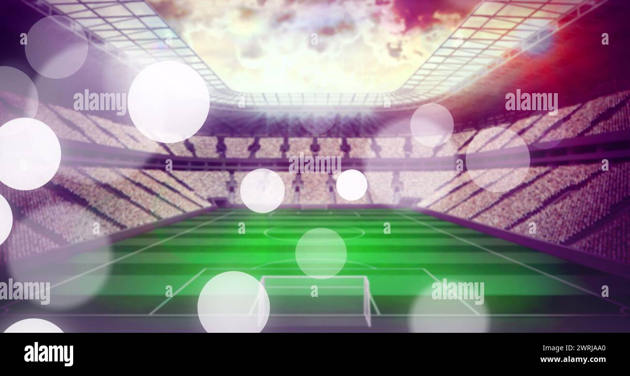 Image of falling glowing dots over football stadium Stock Photo - Alamy