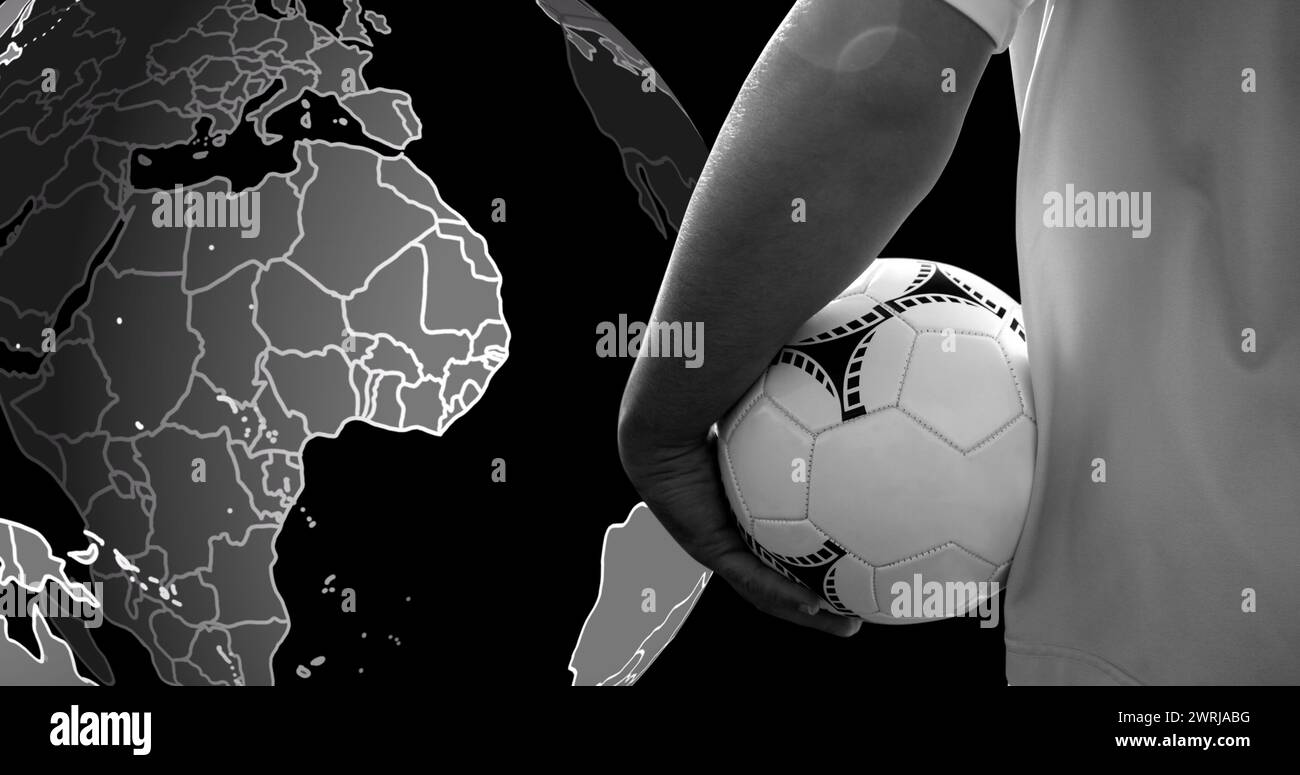 Image of spinning globe over football player with ball Stock Photo - Alamy