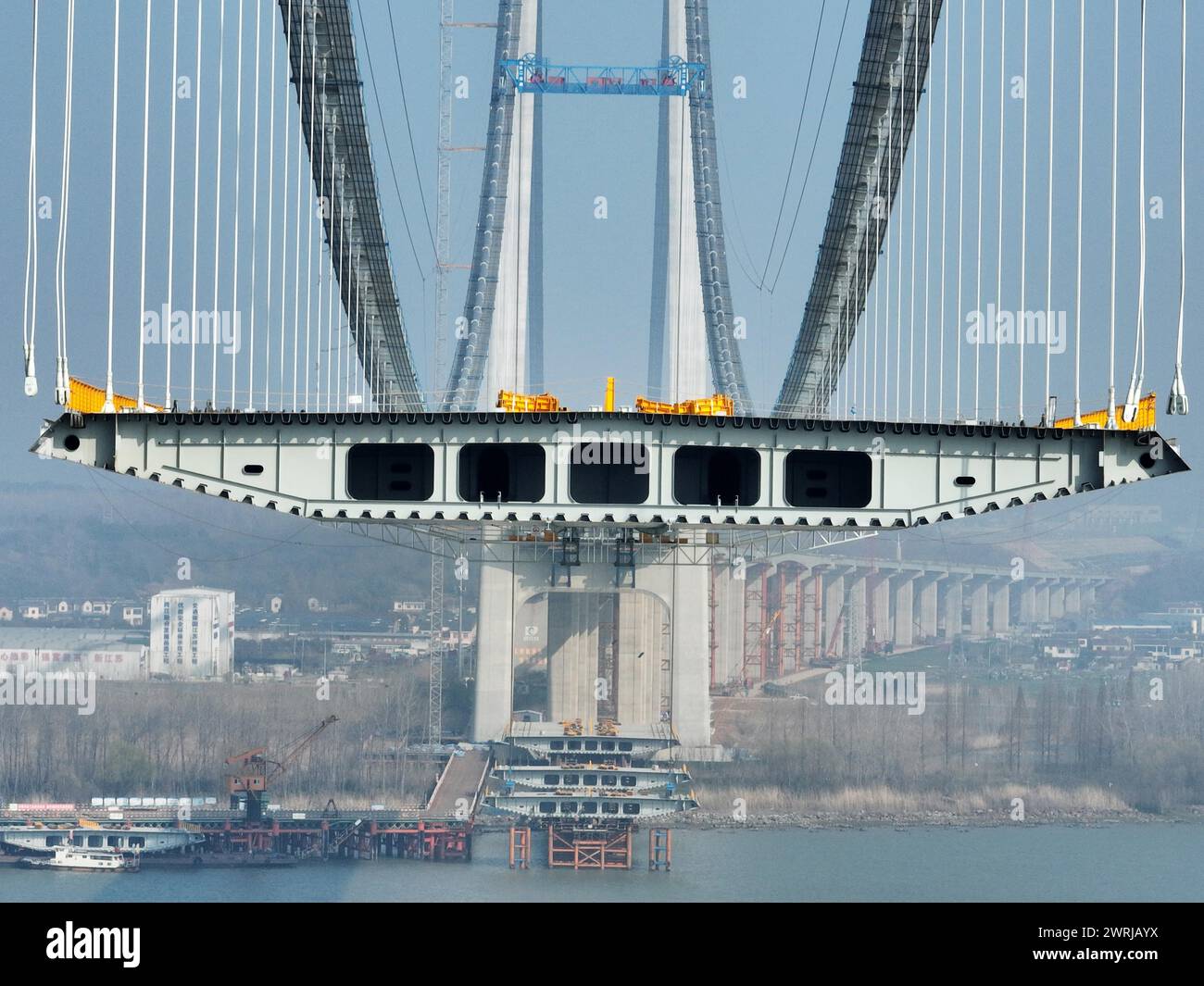 Aerial photo shows the Longtan Yangtze River Bridge under construction ...
