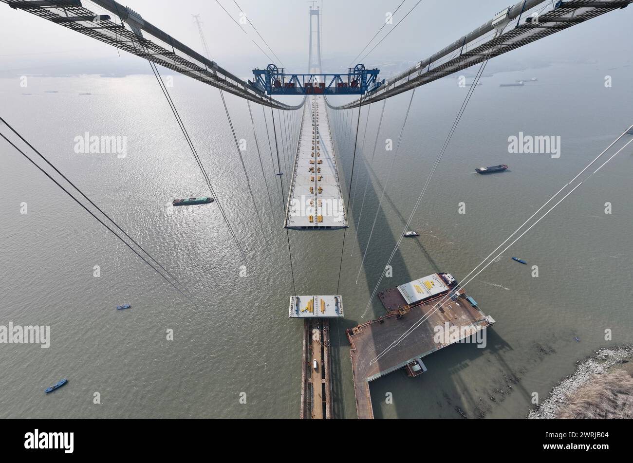 Aerial photo shows the Longtan Yangtze River Bridge under construction ...
