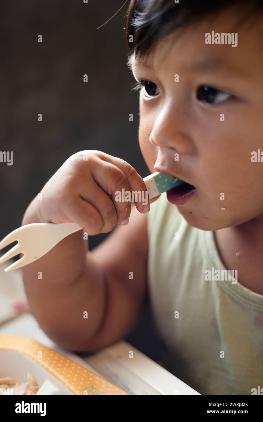 Hand holds fork hi-res stock photography and images - Alamy