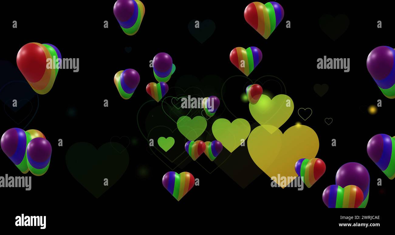 Image of rainbow hearts over black background Stock Photo - Alamy