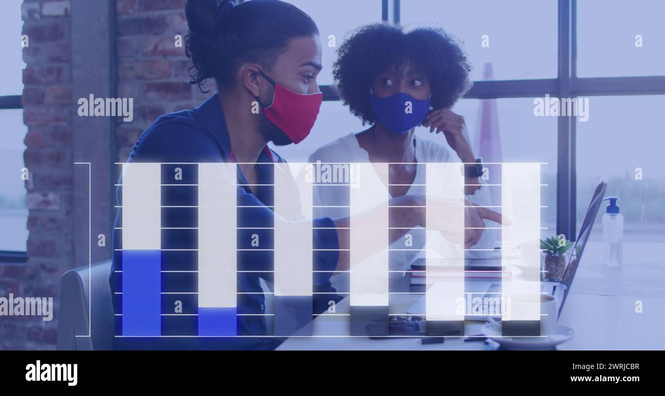 Image of graph over diverse male and female colleagues in face masks ...