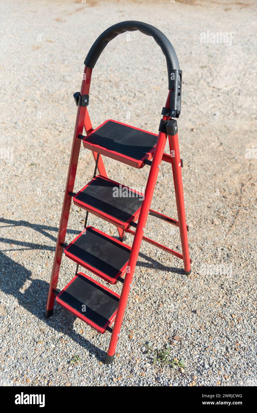 Red aluminium small stairs Stock Photo - Alamy