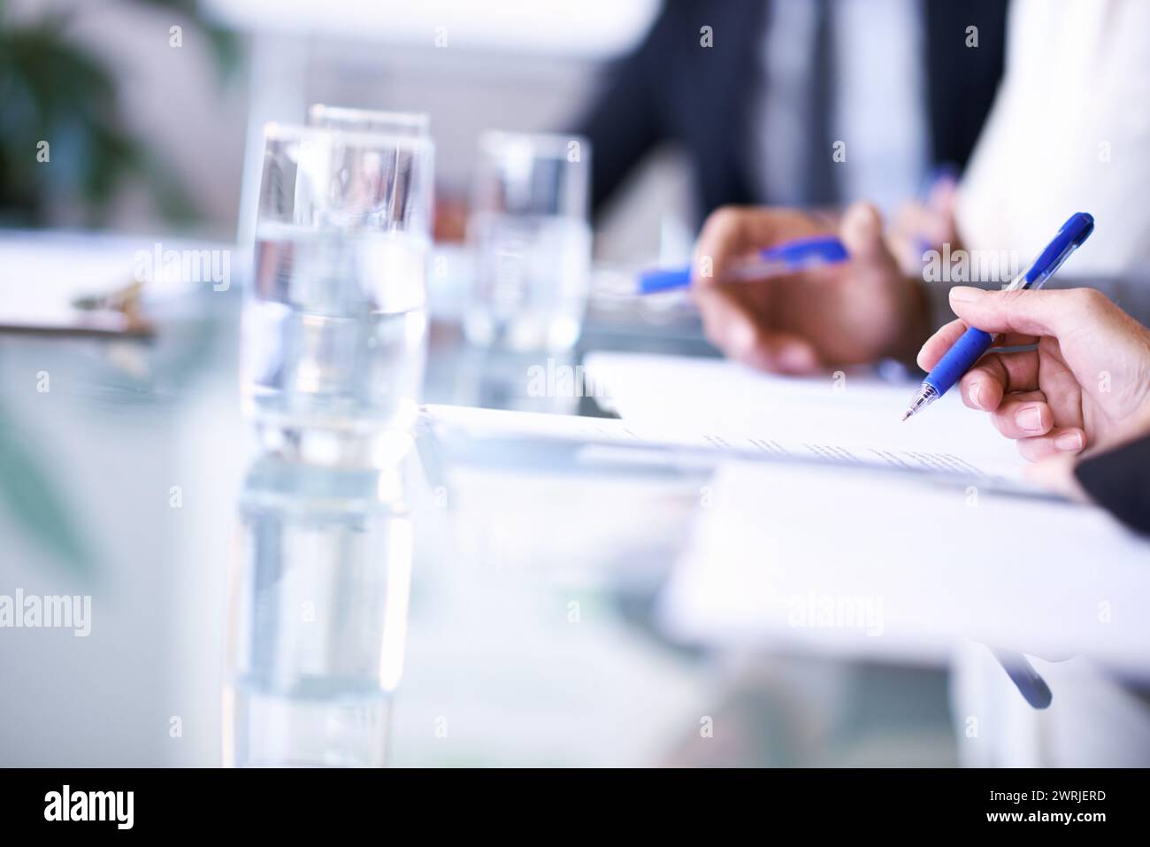 Business, hands and documents for writing in meeting with brainstorming ...