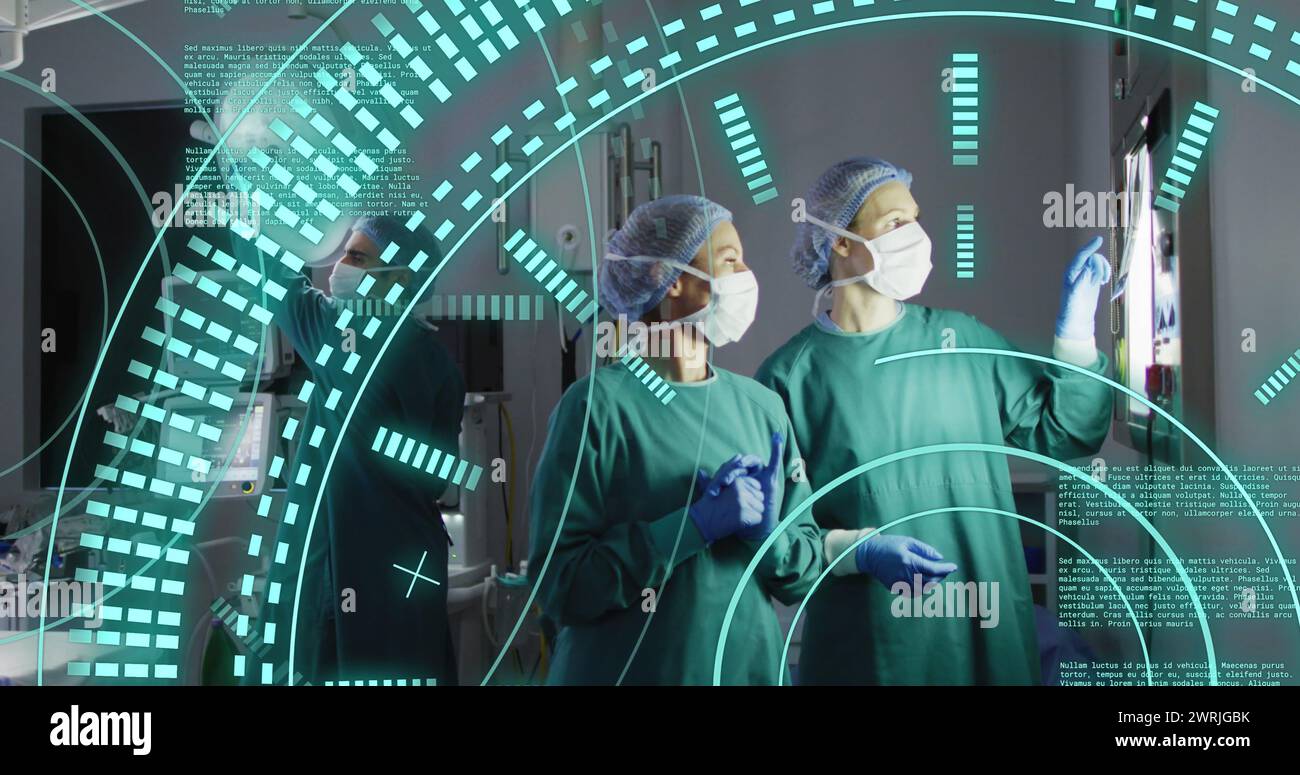 Image of data processing rings over two diverse female surgeons talking ...