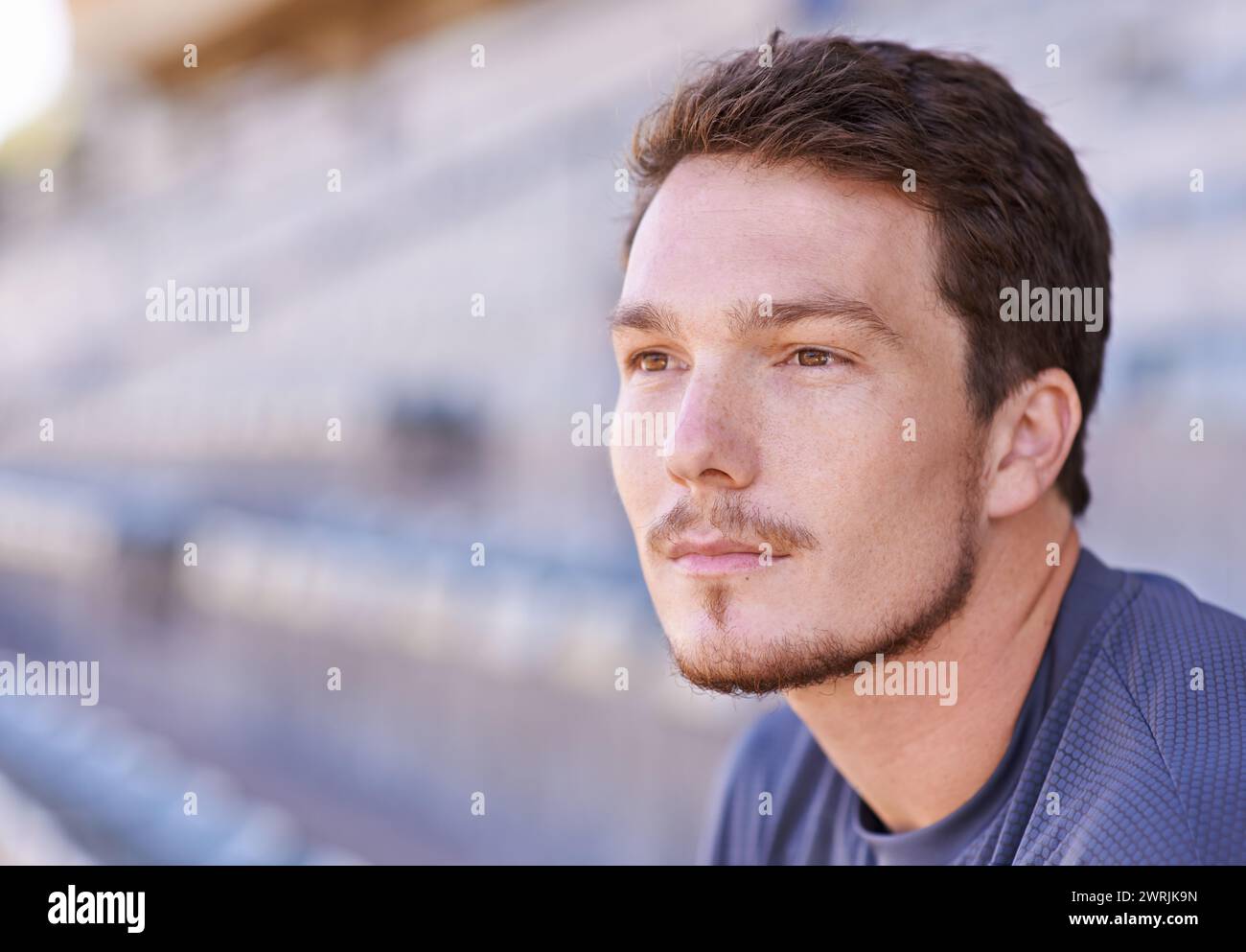 Man fitness thinking stadium hi-res stock photography and images - Alamy