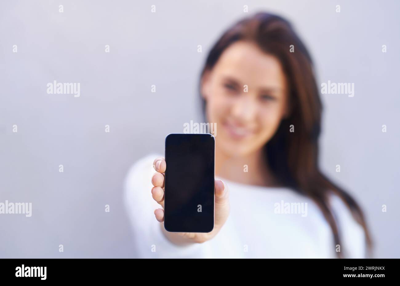 Mockup, person and smartphone on gray background with screen for ...