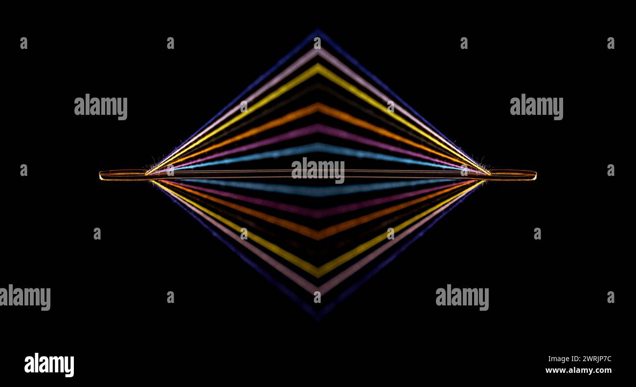 Rainbow Colored Threads Through Needle Eyelet Stock Photo - Alamy