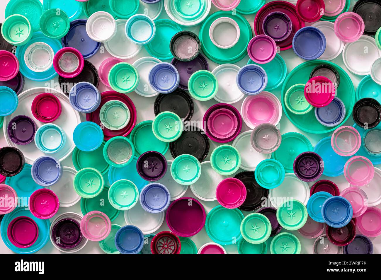 Recycled Multicolored Plastic Bottle Caps Stock Photo - Alamy