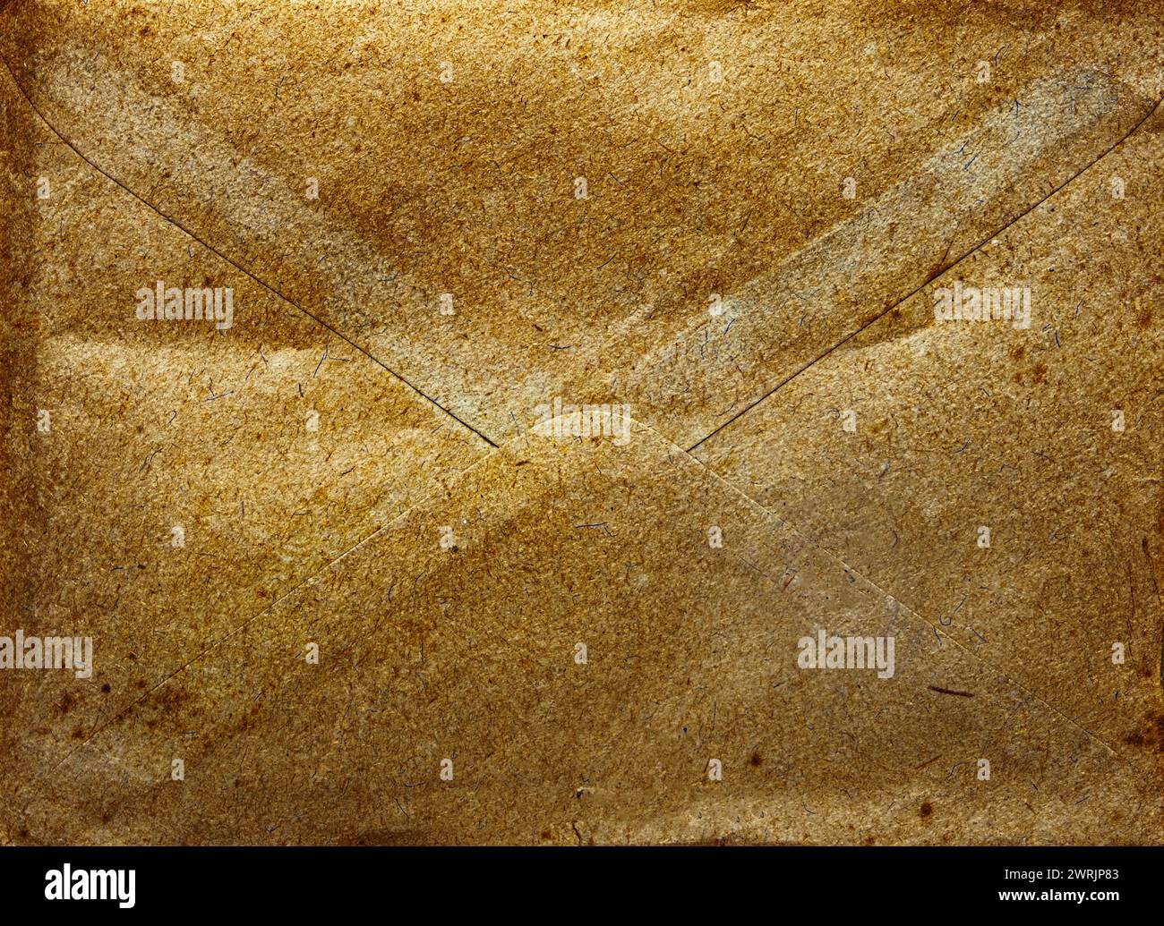 front view closeup of blank old aged closed letter paper envelope with ...