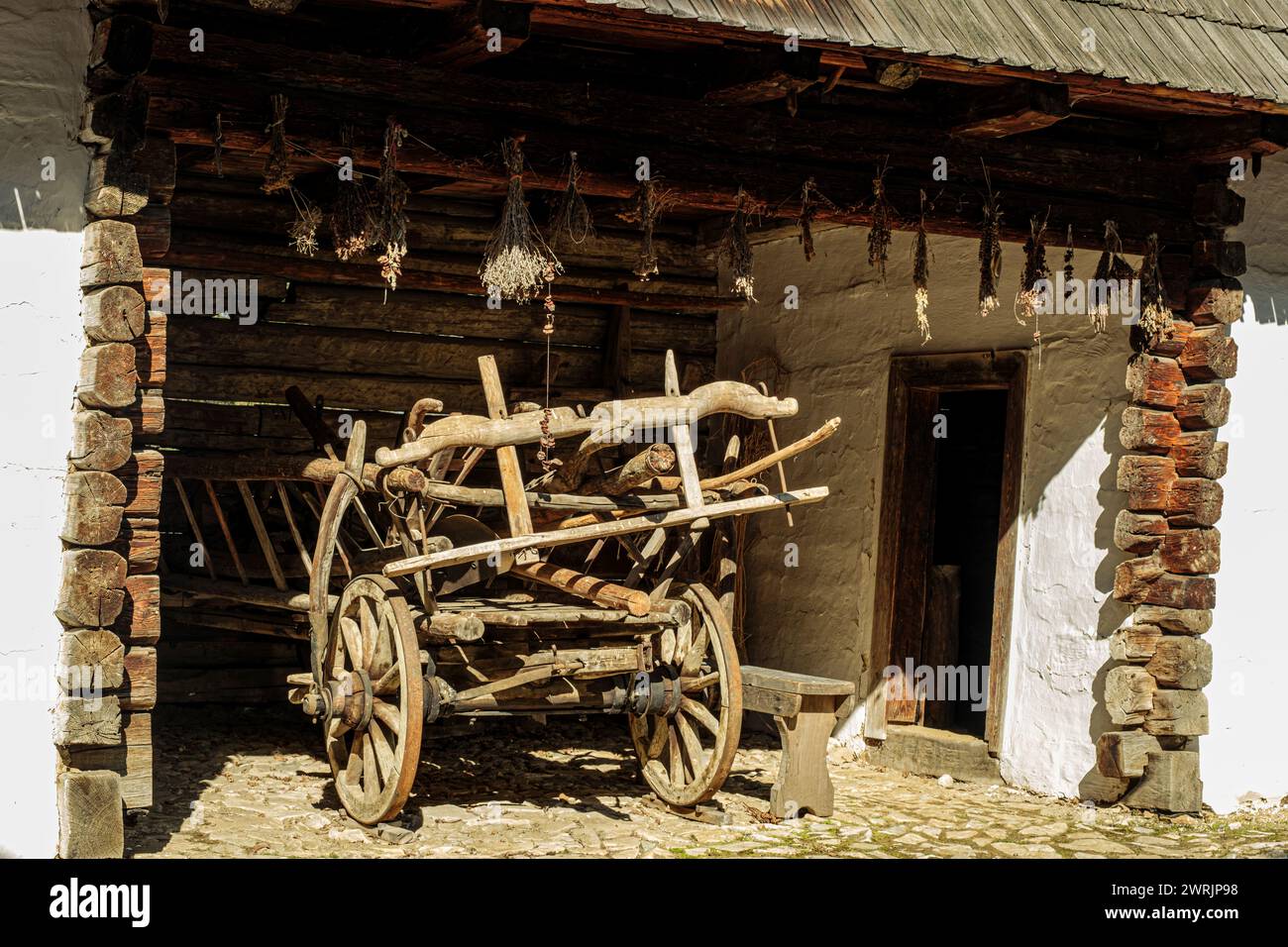 old Romanian carriage with rusty wheels Stock Photo - Alamy