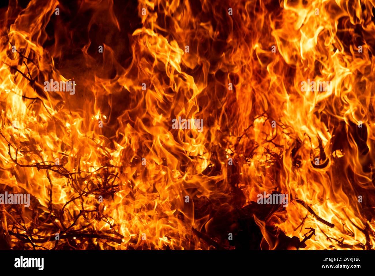 A Intense fire flames with black background and space for text Stock ...