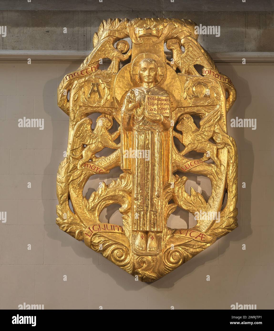 Gilded wooden sculpture of Jesus Christ in glory, in the church of St ...