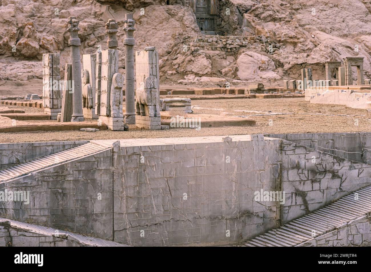Remnants of stone structure in barren field Stock Photo - Alamy
