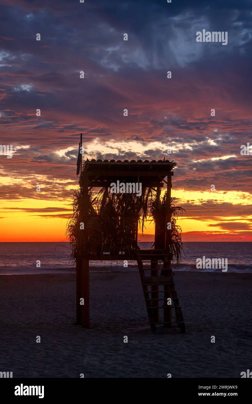 A Lifeguard rest area on the beach during beautiful sunset Stock Photo ...