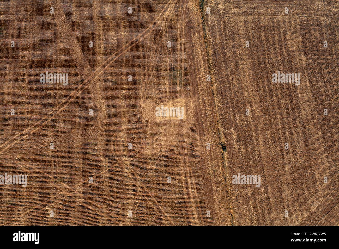 Patterns in harvested fields with watering pipes Stock Photo - Alamy