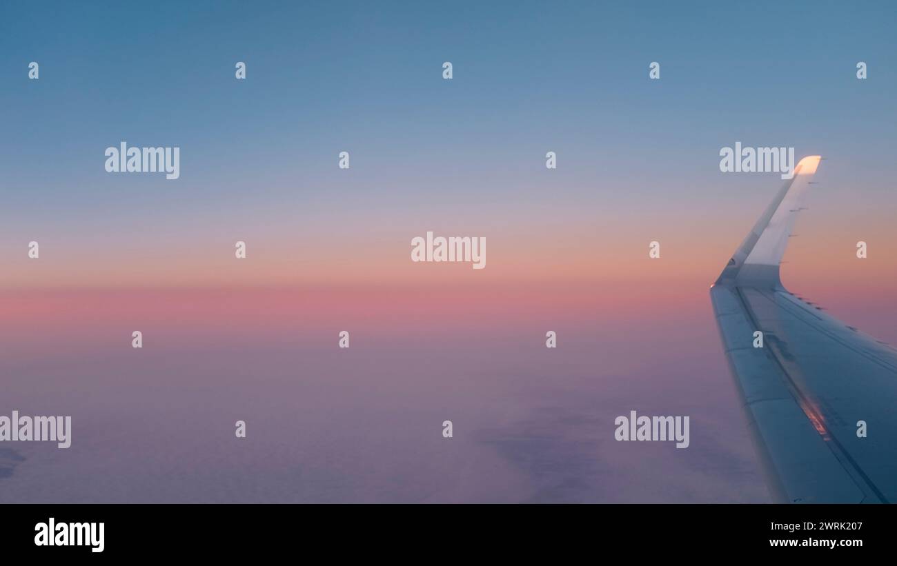 Airplane flying over a snowy landscape in Rovaniemi, Finland on a ...