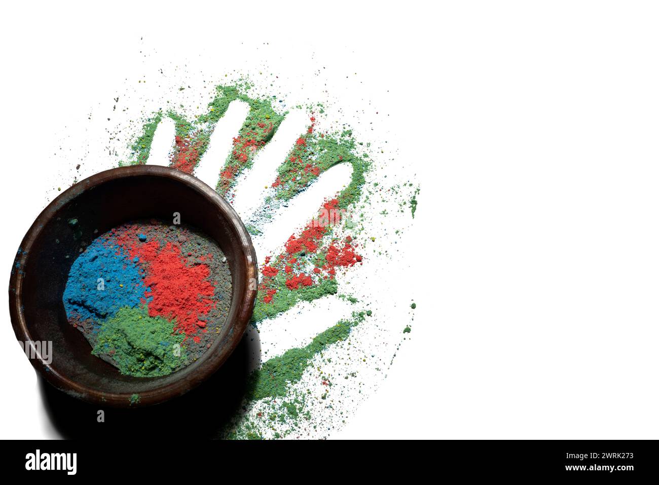 Closeup view of colorful Holi powder isolated over a white background ...