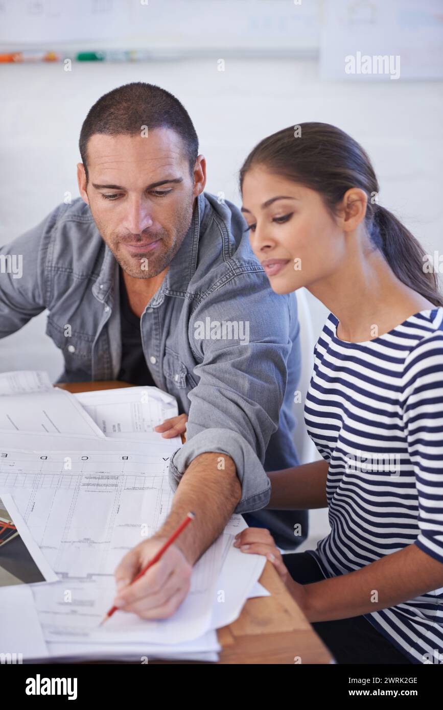 Man, woman and architecture teamwork with floor plan drawing for ...