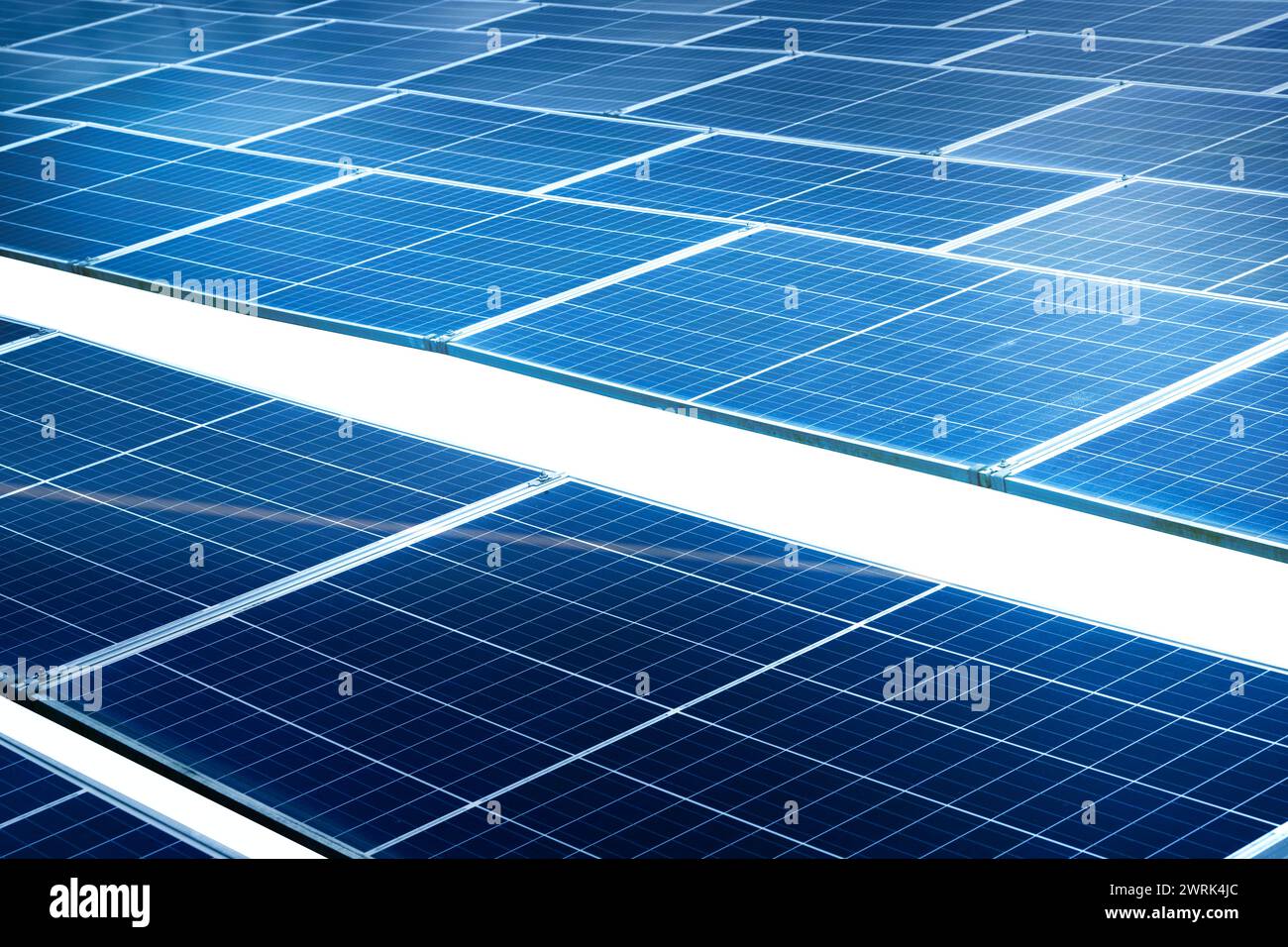 A row of solar cell panels is isolated over a white background ...