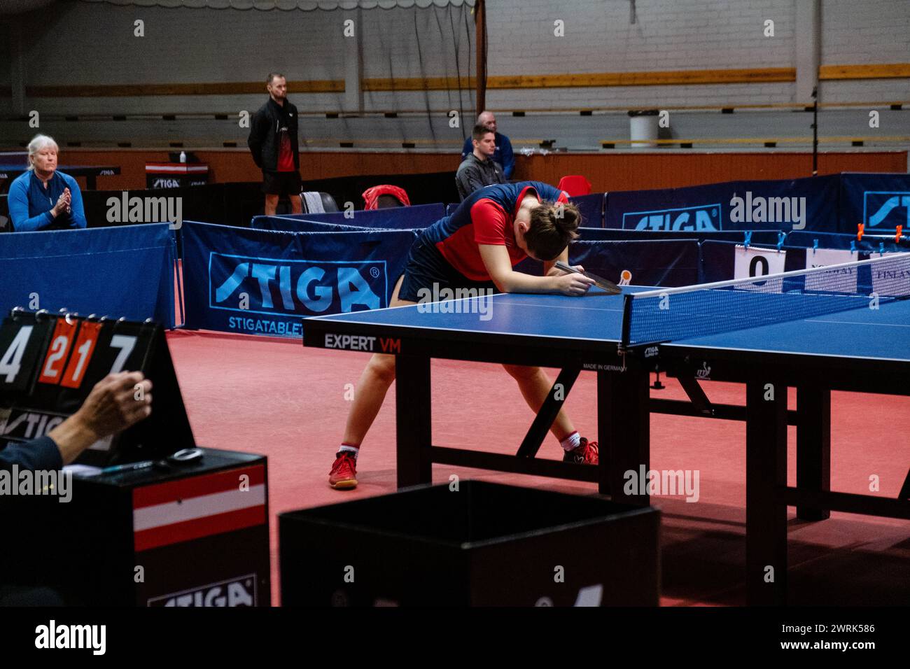 Carlson shows frustration at a miss! Anna KIRICHENKO of Finland (blue ...