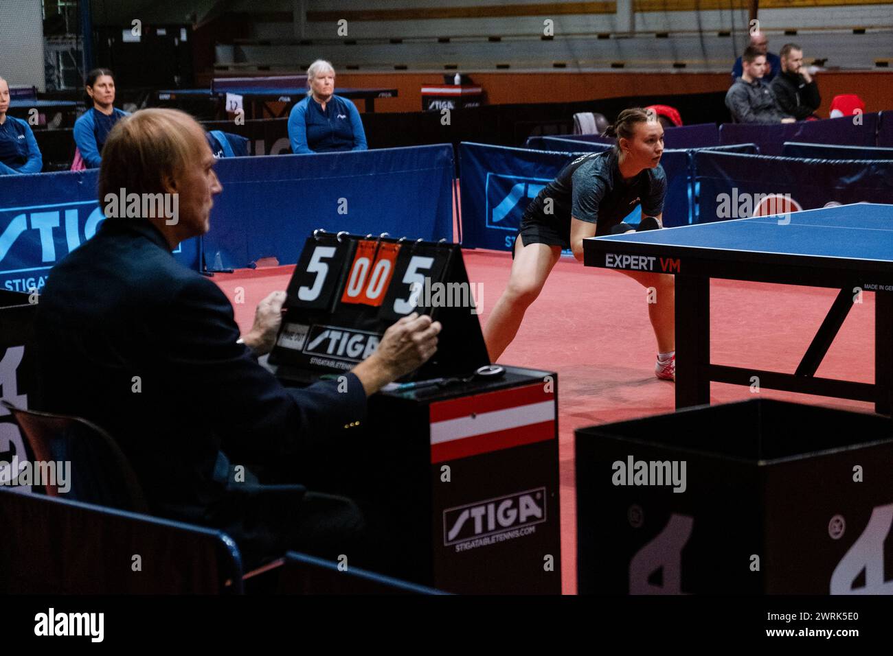 The table tennis umpire keeps score. Anna KIRICHENKO of Finland (blue ...