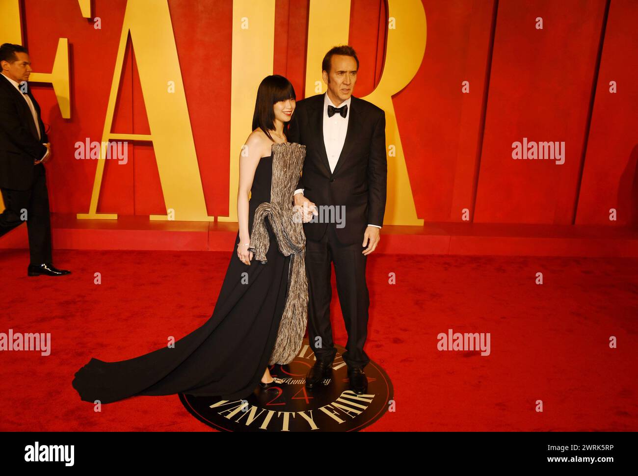 BEVERLY HILLS, CALIFORNIA - MARCH 10: (L-R) Riko Shibata and Nicolas Cage attend the 2024 Vanity ...