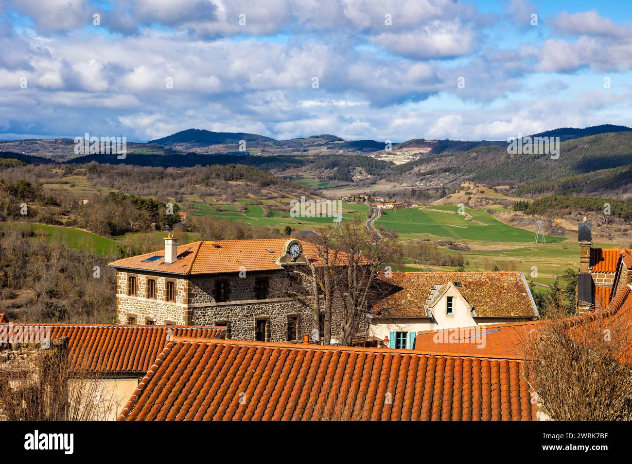 Polignac village near Puy-en-Velay, with its town hall and church ...