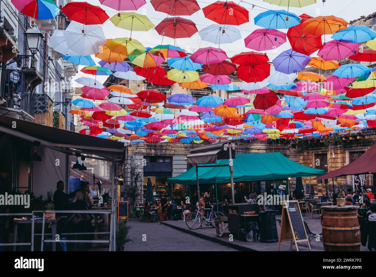 Colourful umbrellas above restaurants in area of food market and La ...