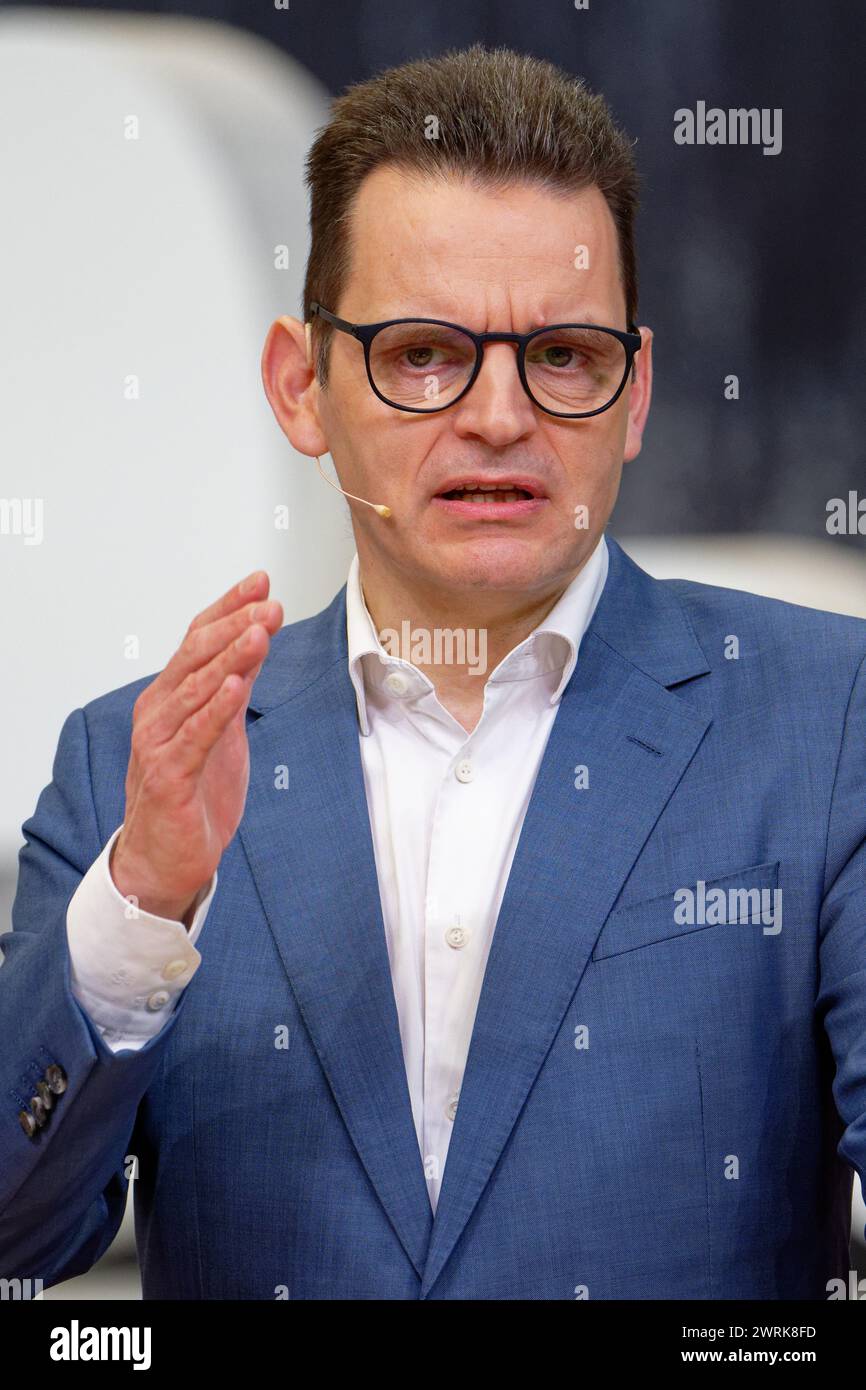 Essen, Germany. 13th Mar, 2024. Eon CEO Leonhard Birnbaum stands on the ...