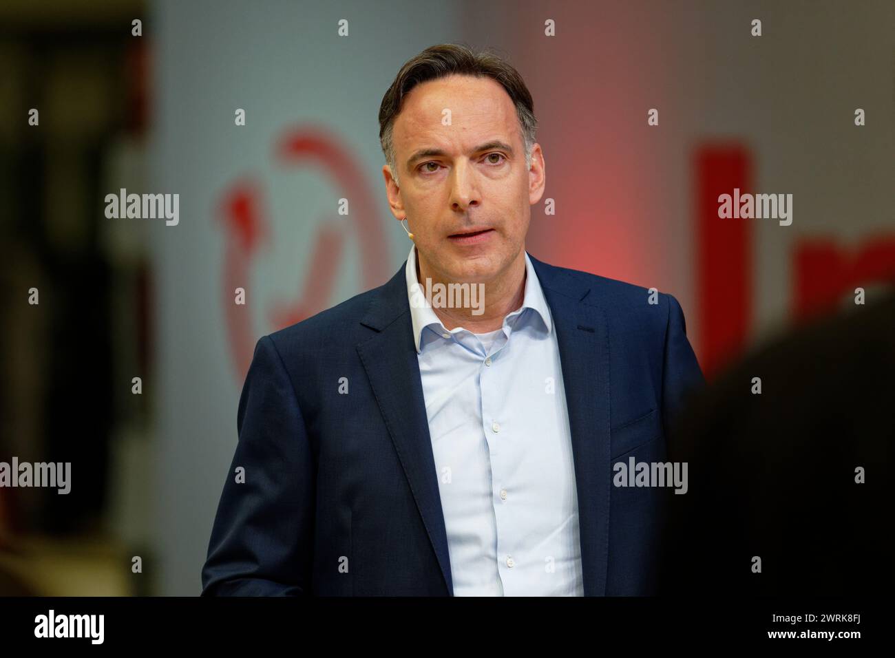 Essen, Germany. 13th Mar, 2024. Eon CFO Marc Spieker on the podium at ...